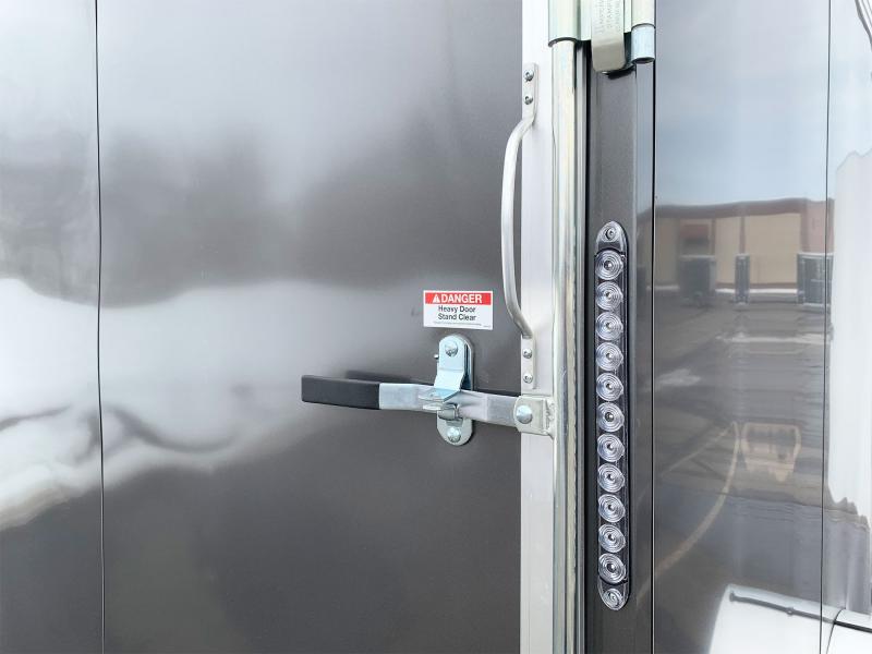 American Hauler 7x12 Enclosed Trailer - Rear ramp door with spring ...